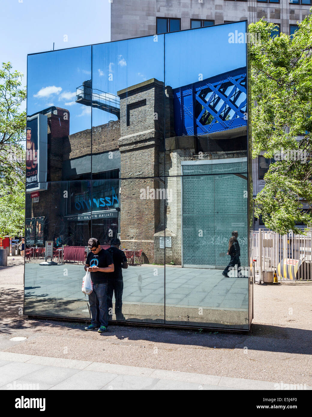 Giant mirror with reflection of railway bridge and man - Sutton Walk ...