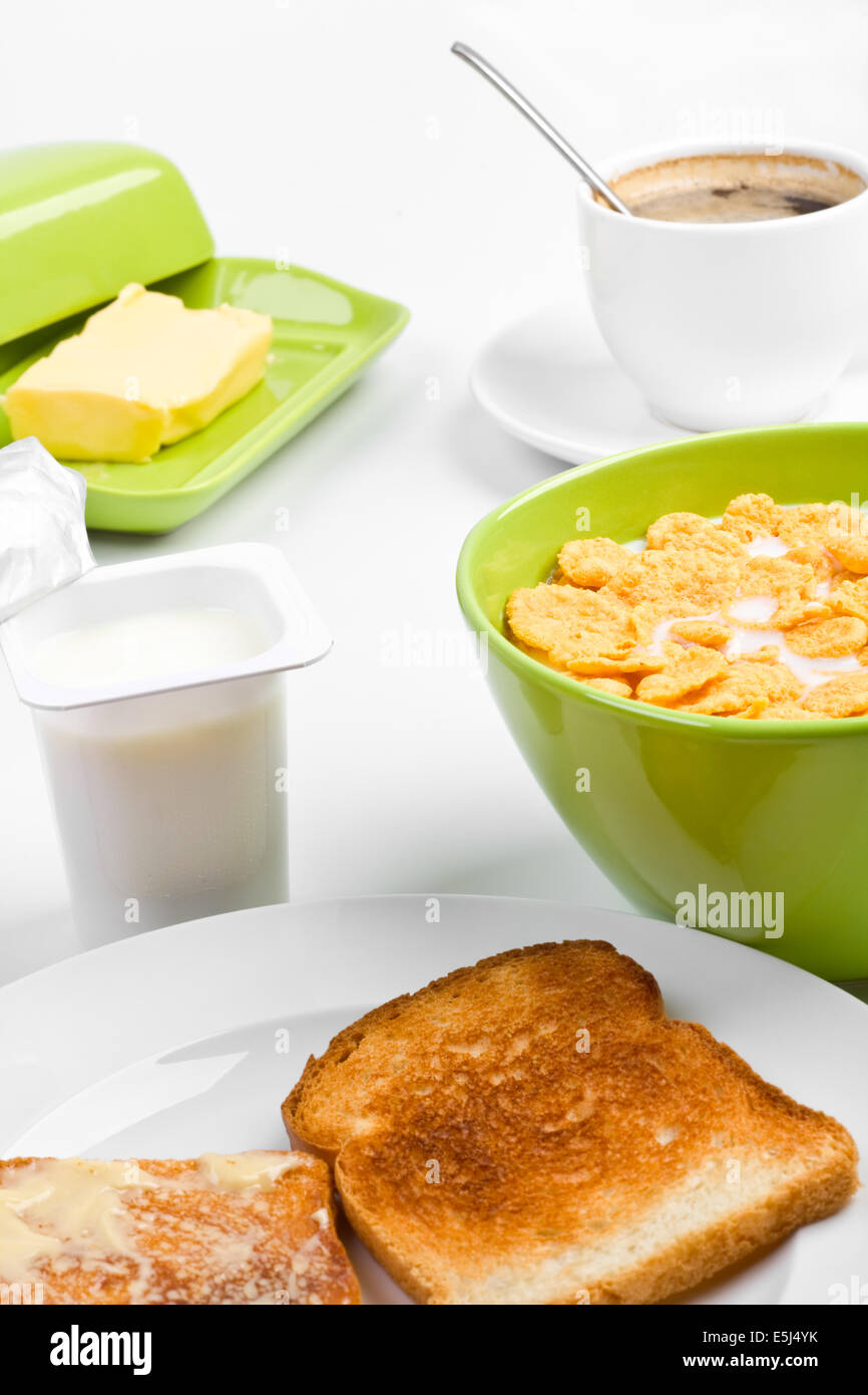 breakfast with cornflakes, two toasts and coffee Stock Photo - Alamy