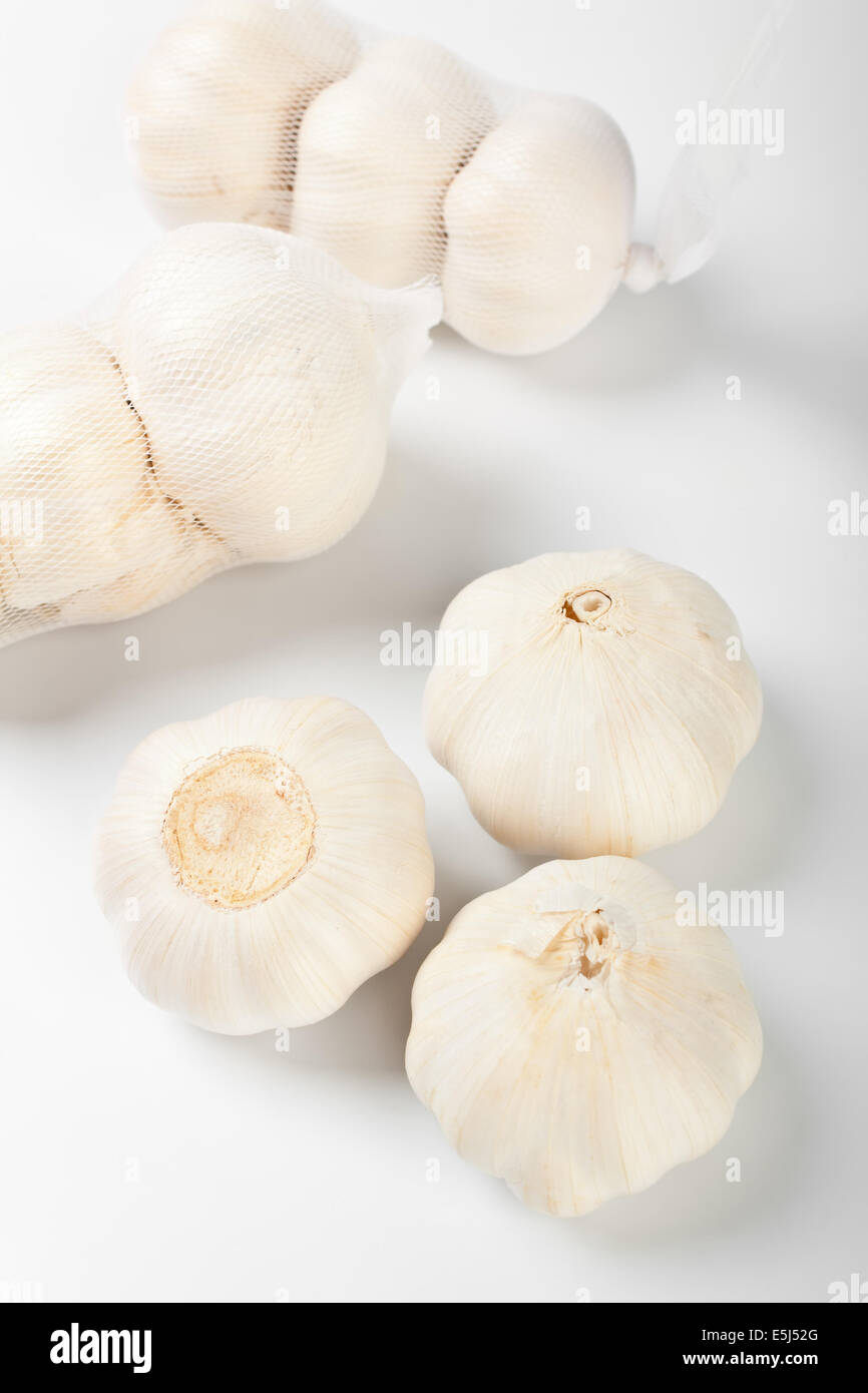 a group of garlic heads close up Stock Photo - Alamy