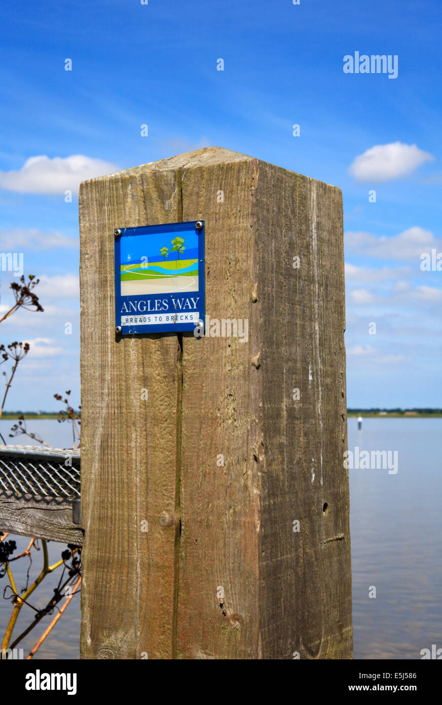 A post with sign indicating the Angles Way long distance footpath at ...