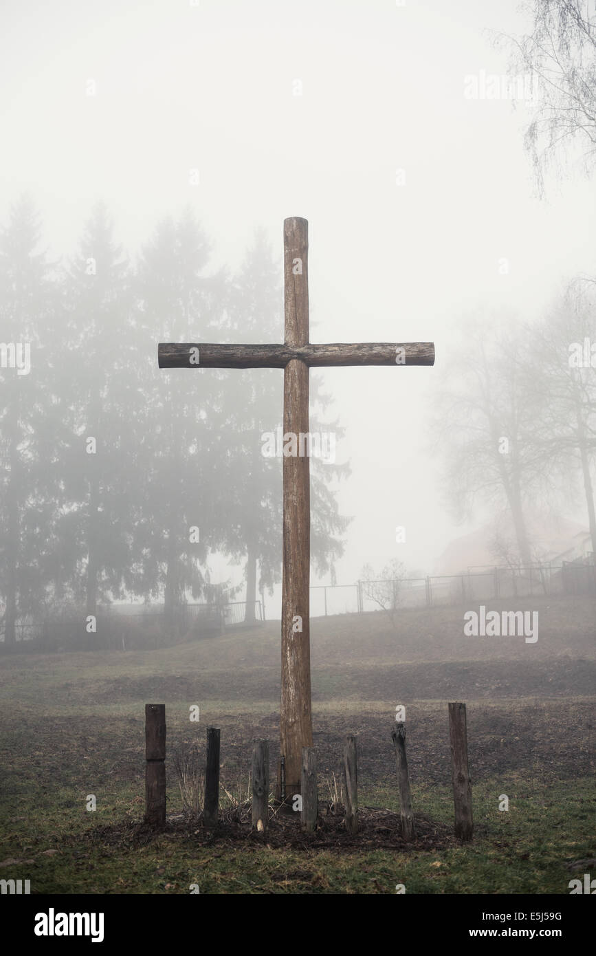 Christian cross in the fog Stock Photo - Alamy
