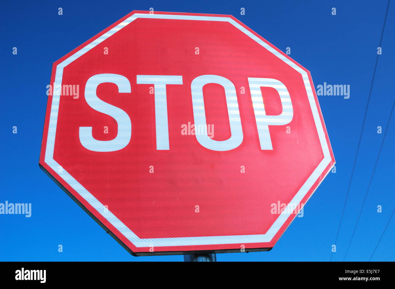 Stop sign in country road Stock Photo - Alamy