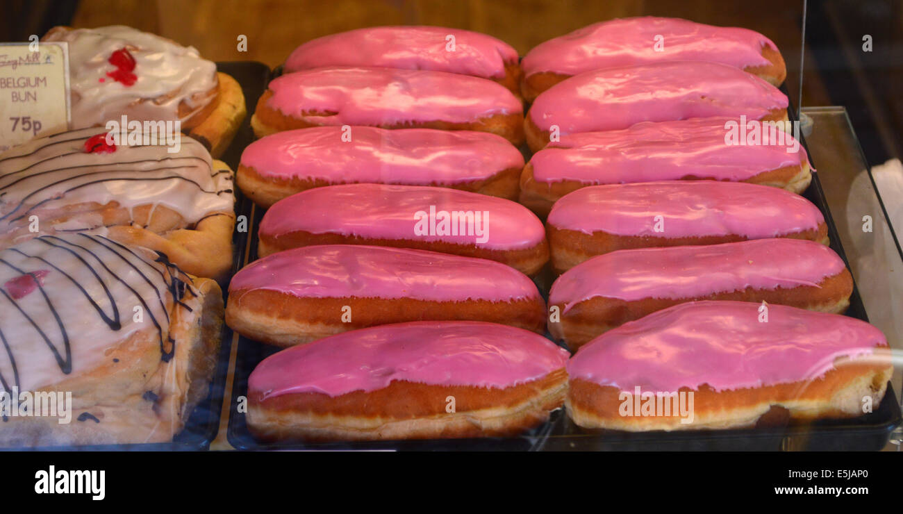 Iced buns in bakers window display, pink, a tasty photograph Stock ...