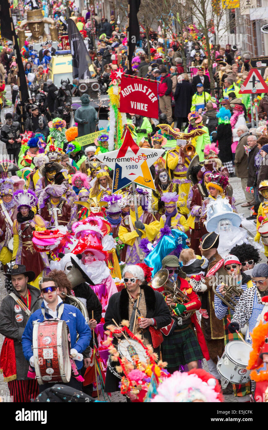 Netherlands, Maastricht, Carnival festival. Costumed people in parade ...