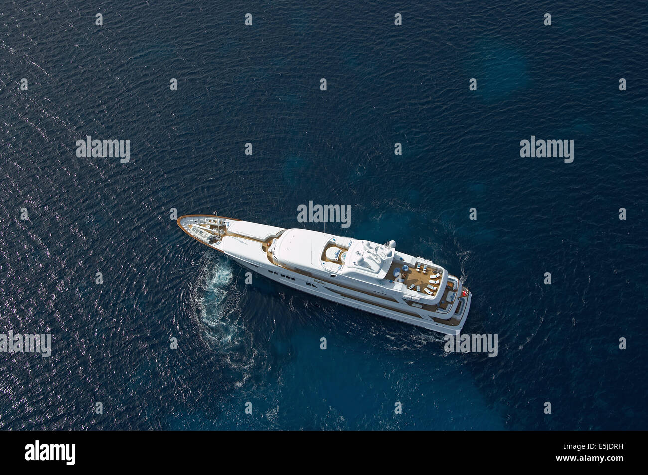 Aerial View of Luxury Superyacht Callisto Cruising on Calm Blue Ocean ...