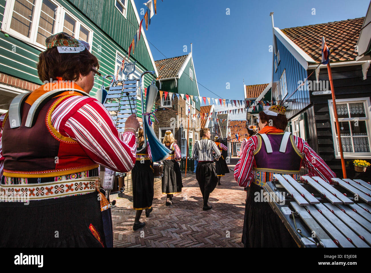 Netherlands, Marken, People dressed in traditional costume on Kingsday ...