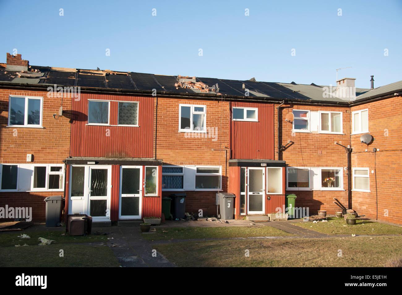 Chimney stack collapsed roof storm damage insurance Stock Photo - Alamy