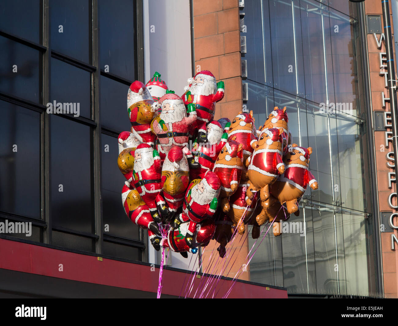 Bunch of Father Christmas Santa Balloons Stock Photo - Alamy
