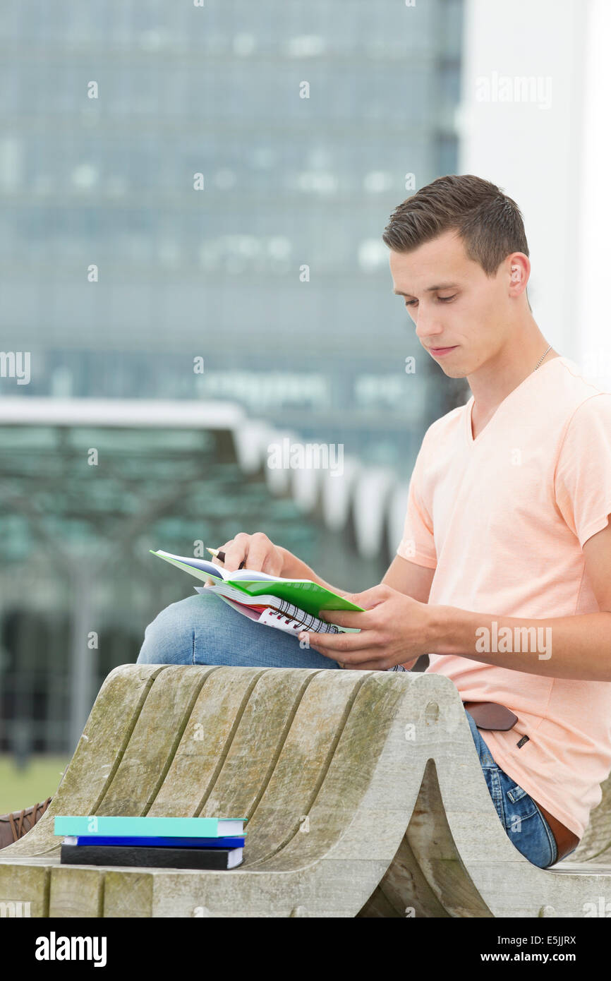 Young student learning outdoor Stock Photo - Alamy