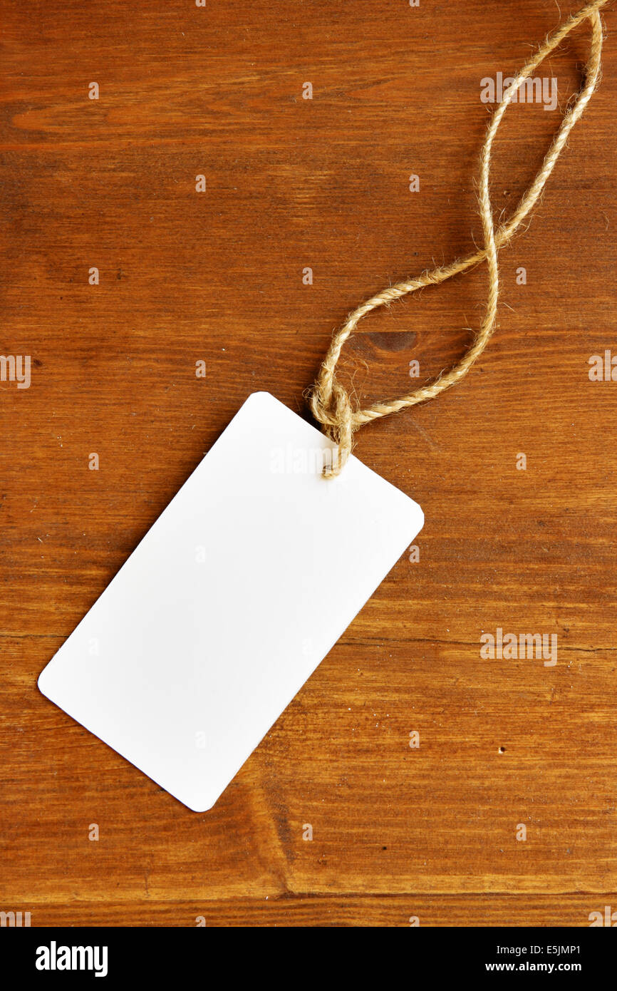 Blank tag over wooden background, place your own text here Stock Photo ...