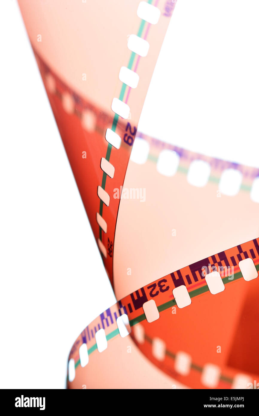 Processed 35 mm film isolated over white background Stock Photo - Alamy
