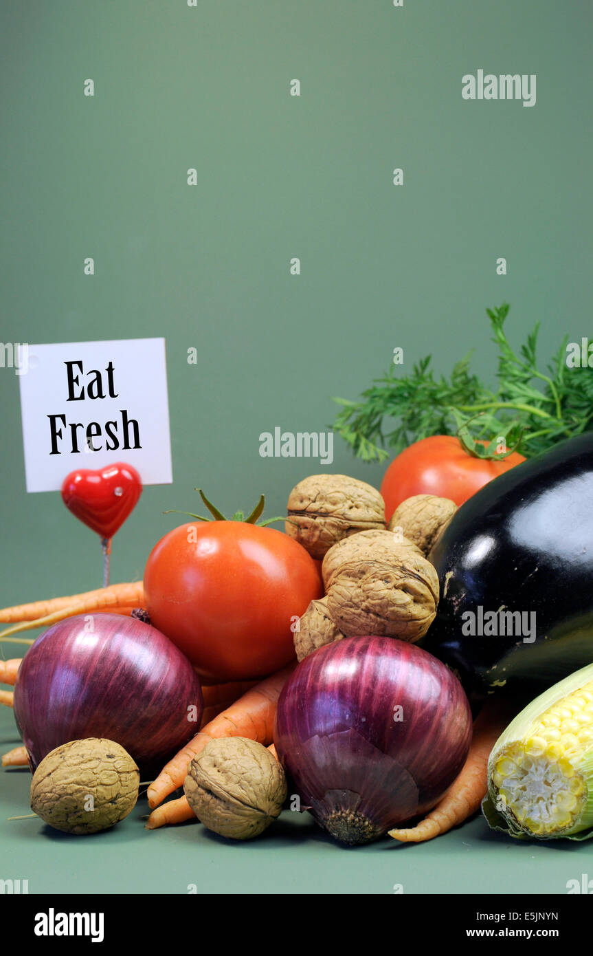 Eat Fresh message sign with fresh raw vegetarian food including ...