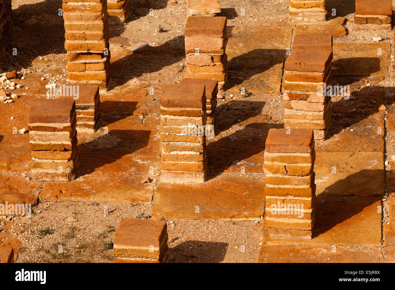 Sun sets on the pilae stacks (supports for underfloor heating) in the ...