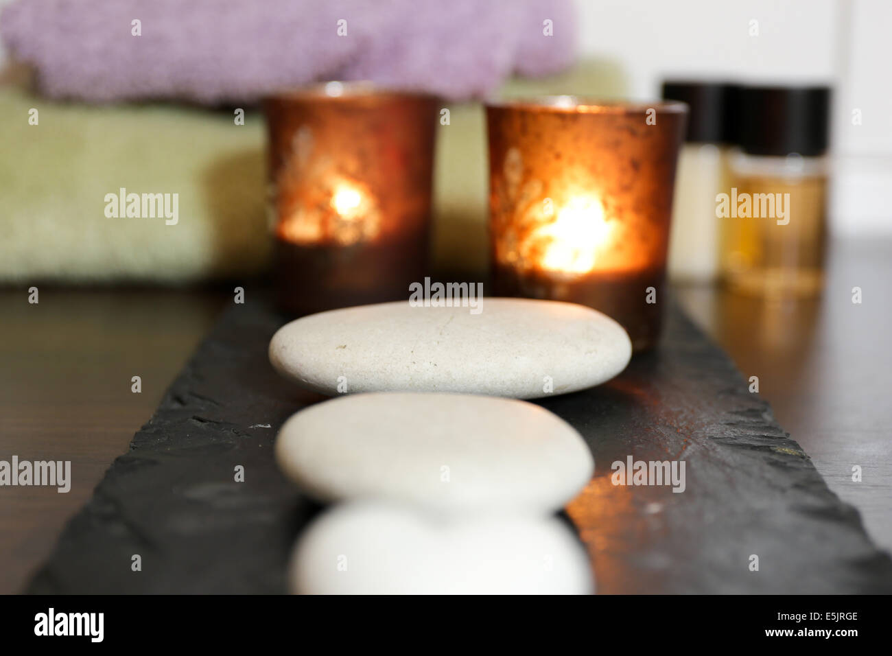 Resort soothing spa stone summer towel vacation hi-res stock ...