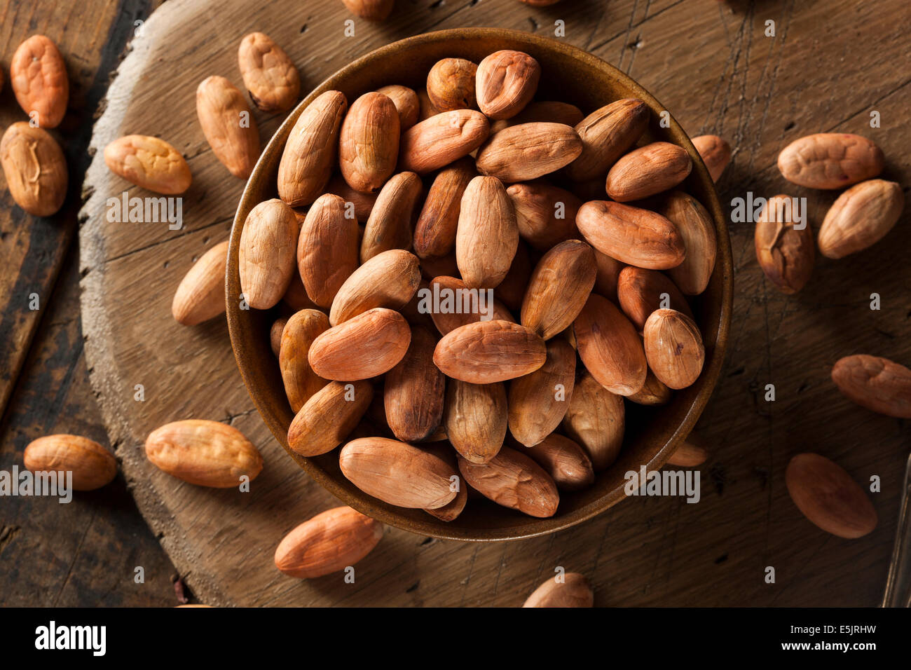 Raw Organic Cocoa Beans in a Bowl Stock Photo - Alamy