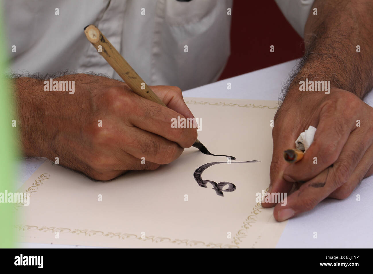 Arabic calligraphy artist hi-res stock photography and images - Alamy