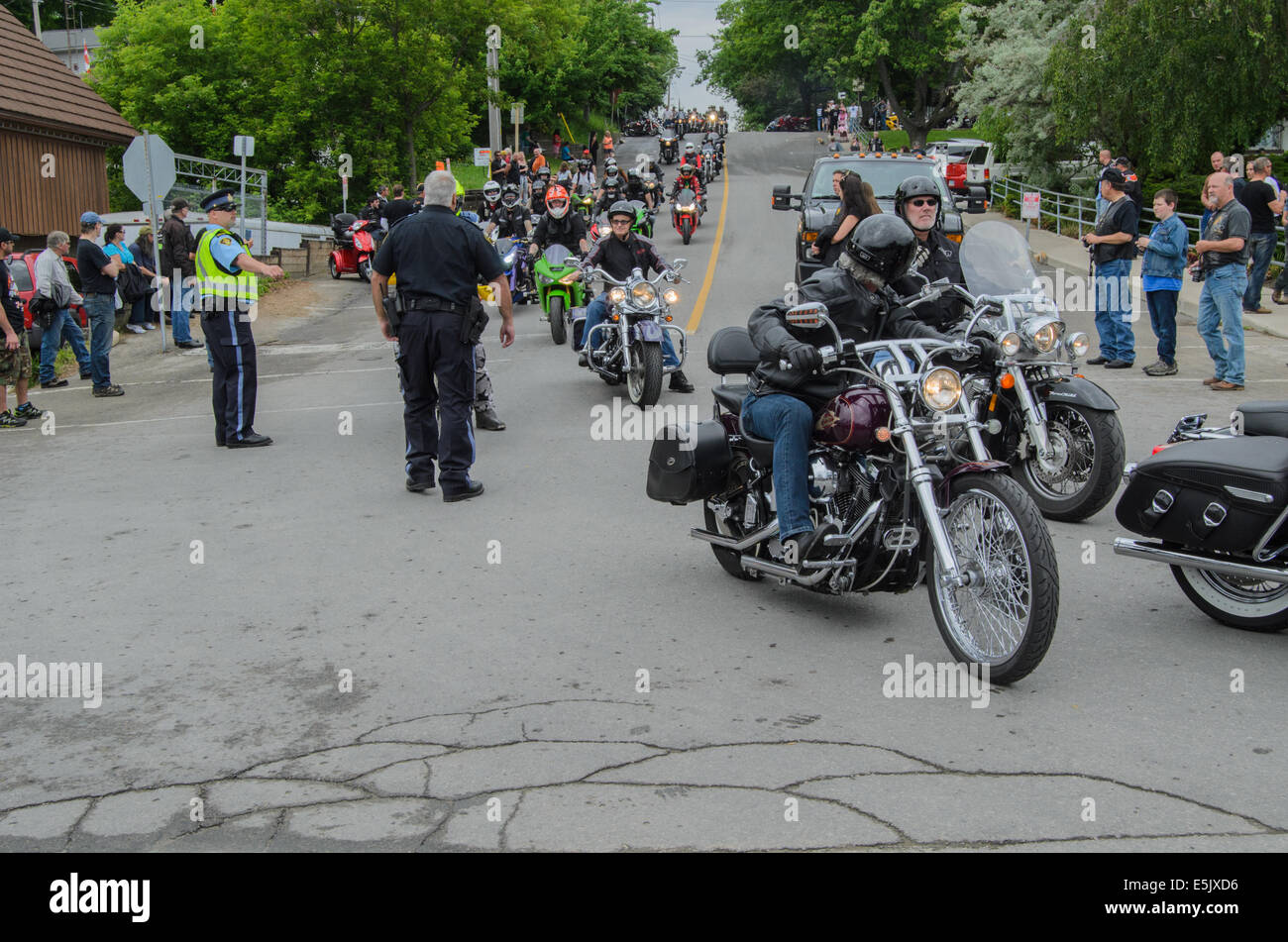 Ontario Provincial Police Officers direct traffic during the "Friday ...