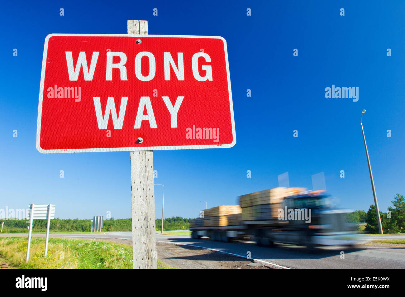 Truck on a road with a wrong way sign hi-res stock photography and ...