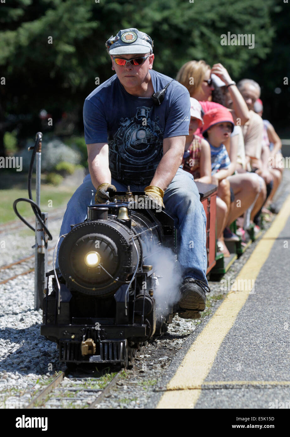 Burnaby, Canada. 2nd Aug, 2014. An train enthusiast controls a steam ...