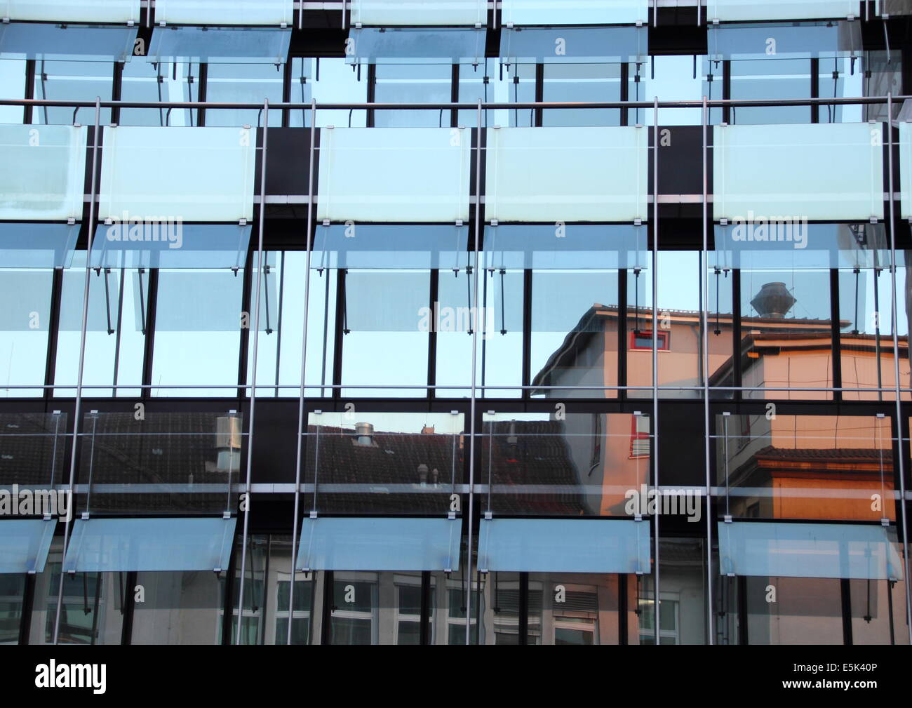Window reflection of old building in office facade - horizontal Stock ...