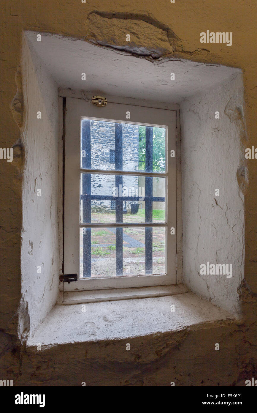 Historic Mount Holly Prison window looking out into courtyard Stock ...