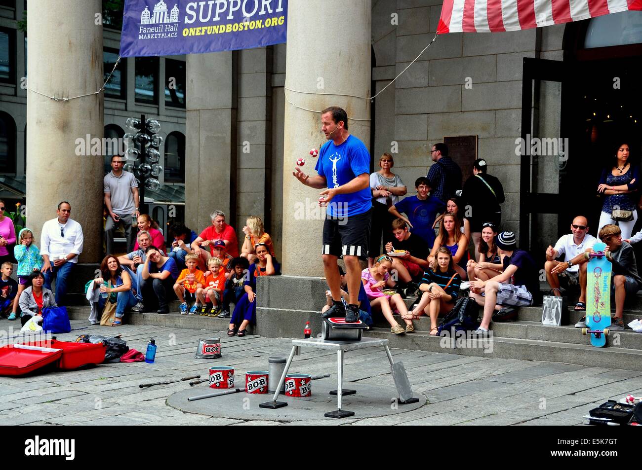 BOSTON, MASSACHUSETTS: A juggler performs for the crowds gathered at ...