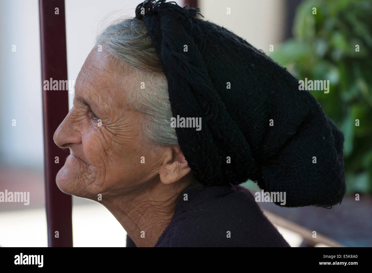 Old woman with traditional kerchief at the market, Stepanakert ...