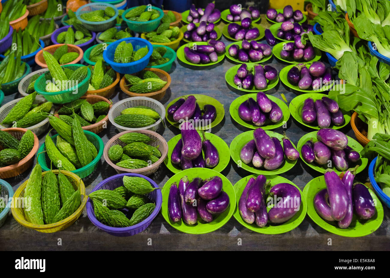 Outdoor hawker stall selling lady finger, bitter gourd, eggplant etc ...