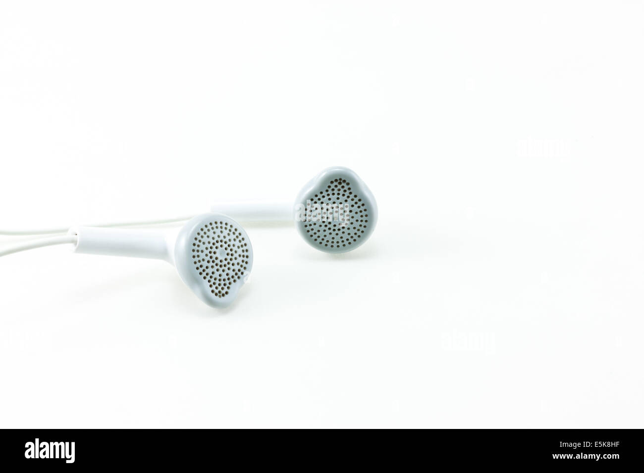 the earphone on paper background Stock Photo - Alamy
