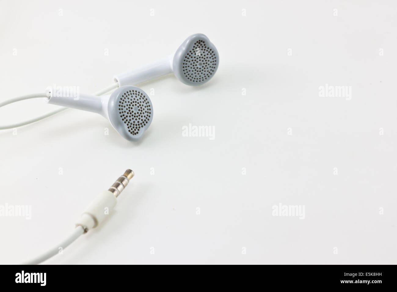 the earphone on paper background Stock Photo - Alamy
