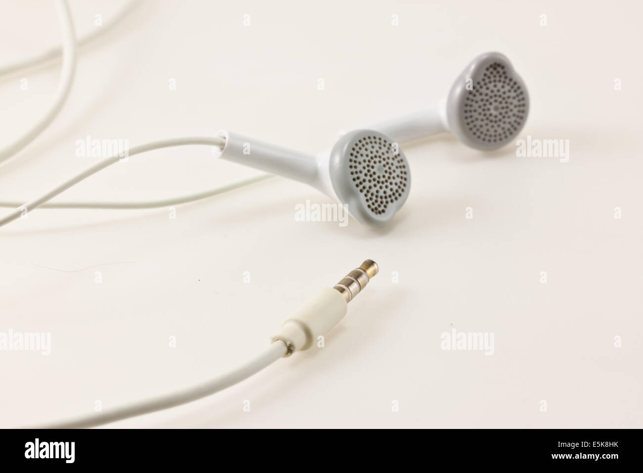 the earphone on paper background Stock Photo - Alamy