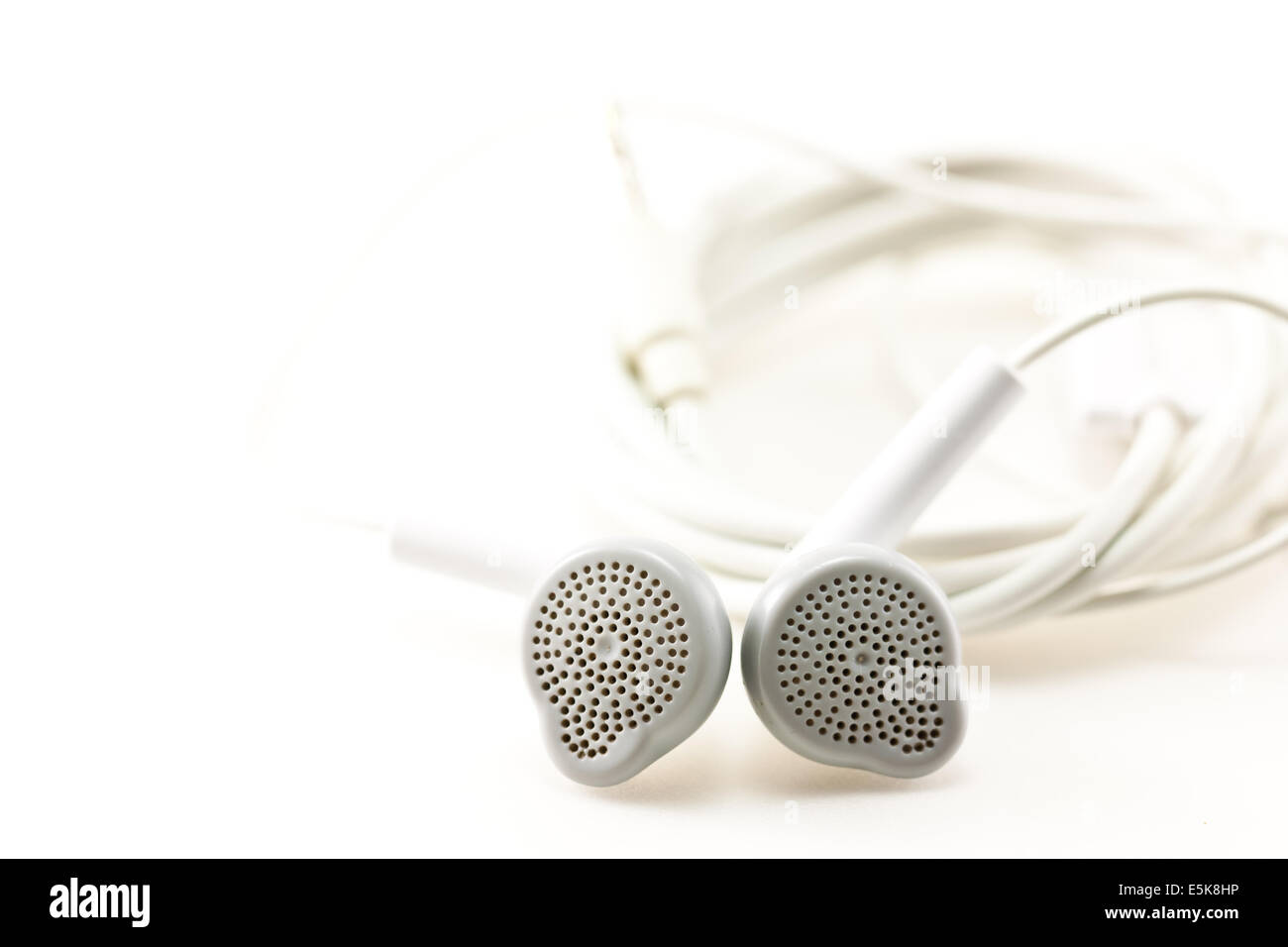 the earphone on paper background Stock Photo - Alamy