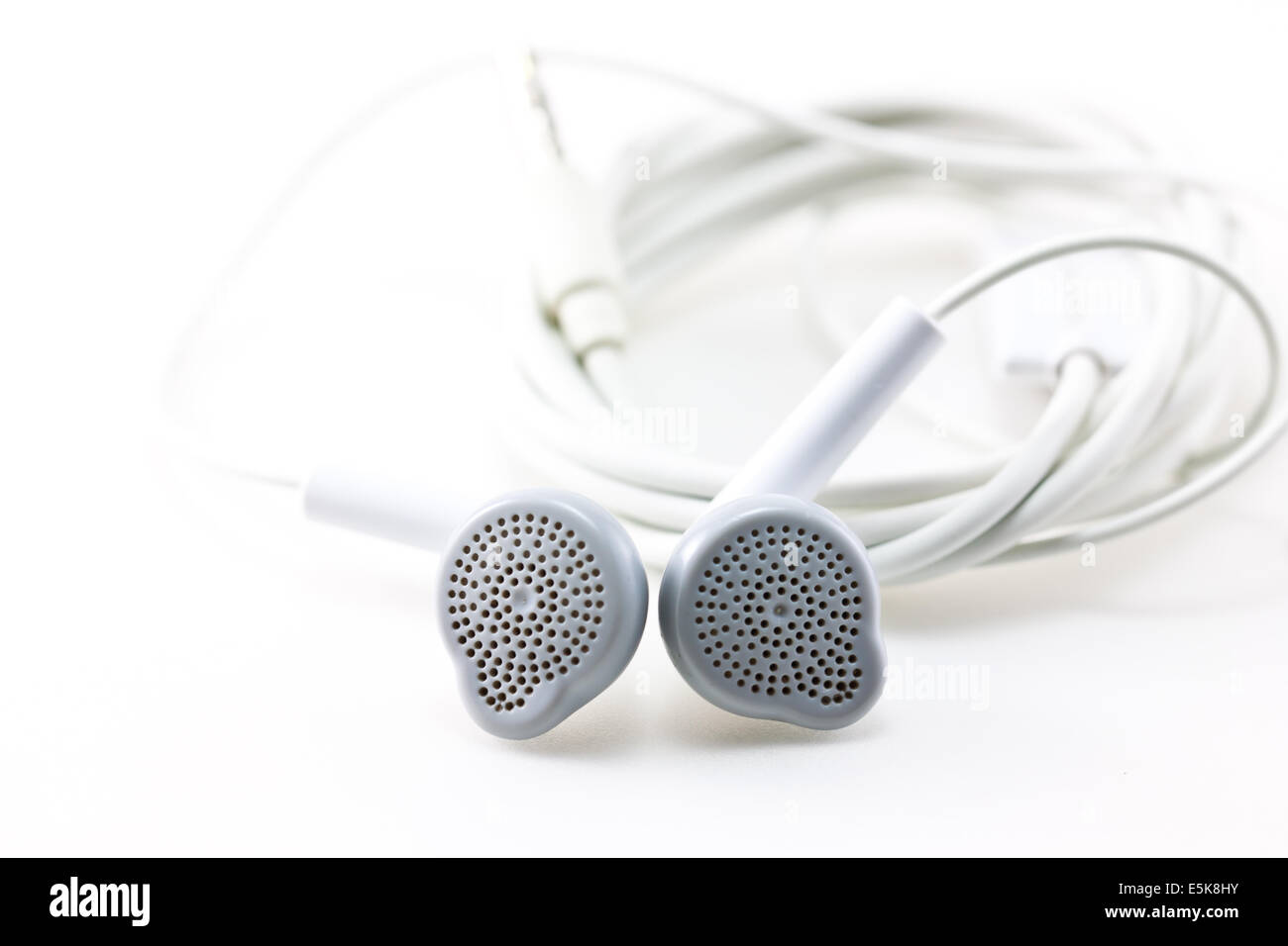 the earphone on paper background Stock Photo - Alamy