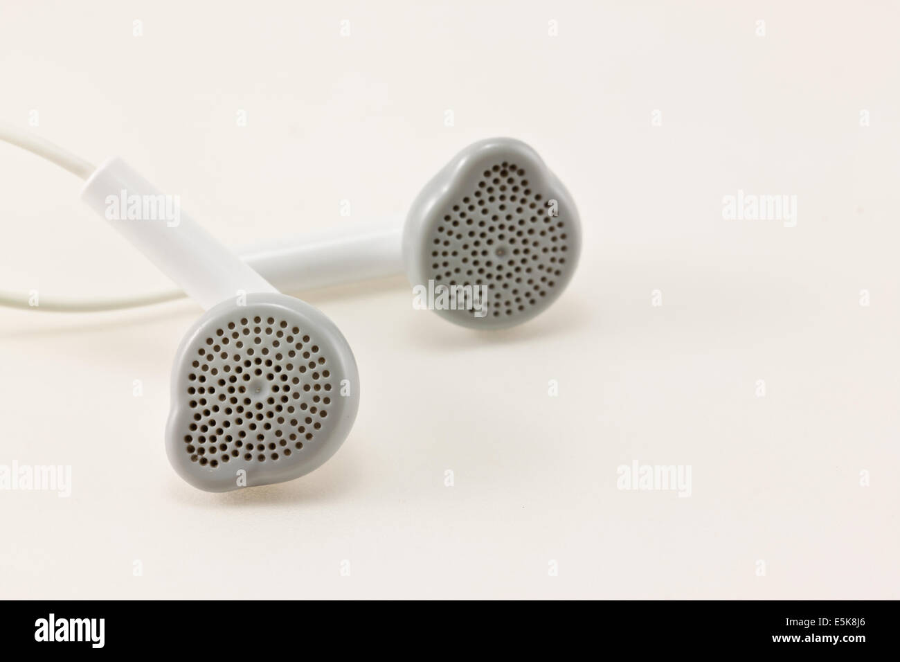 the earphone on paper background Stock Photo - Alamy
