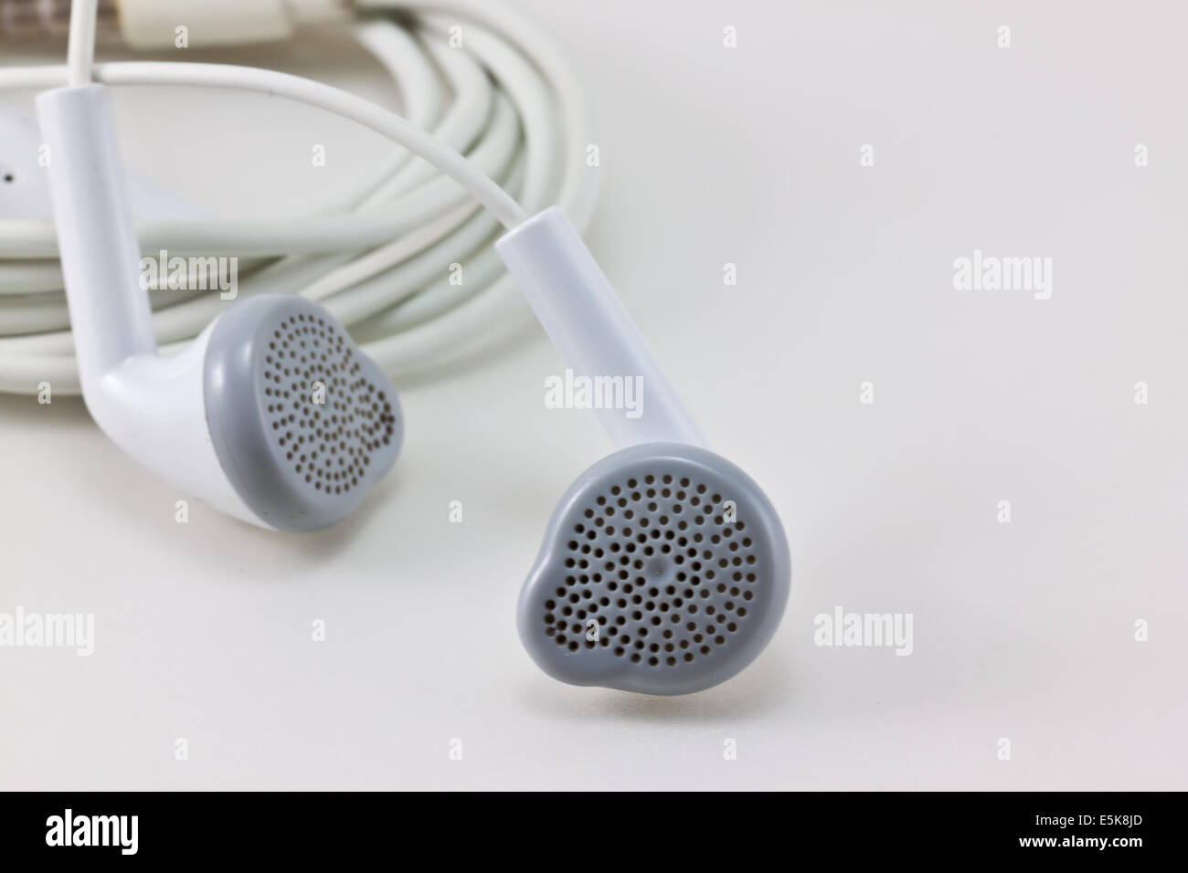 the earphone on paper background Stock Photo - Alamy