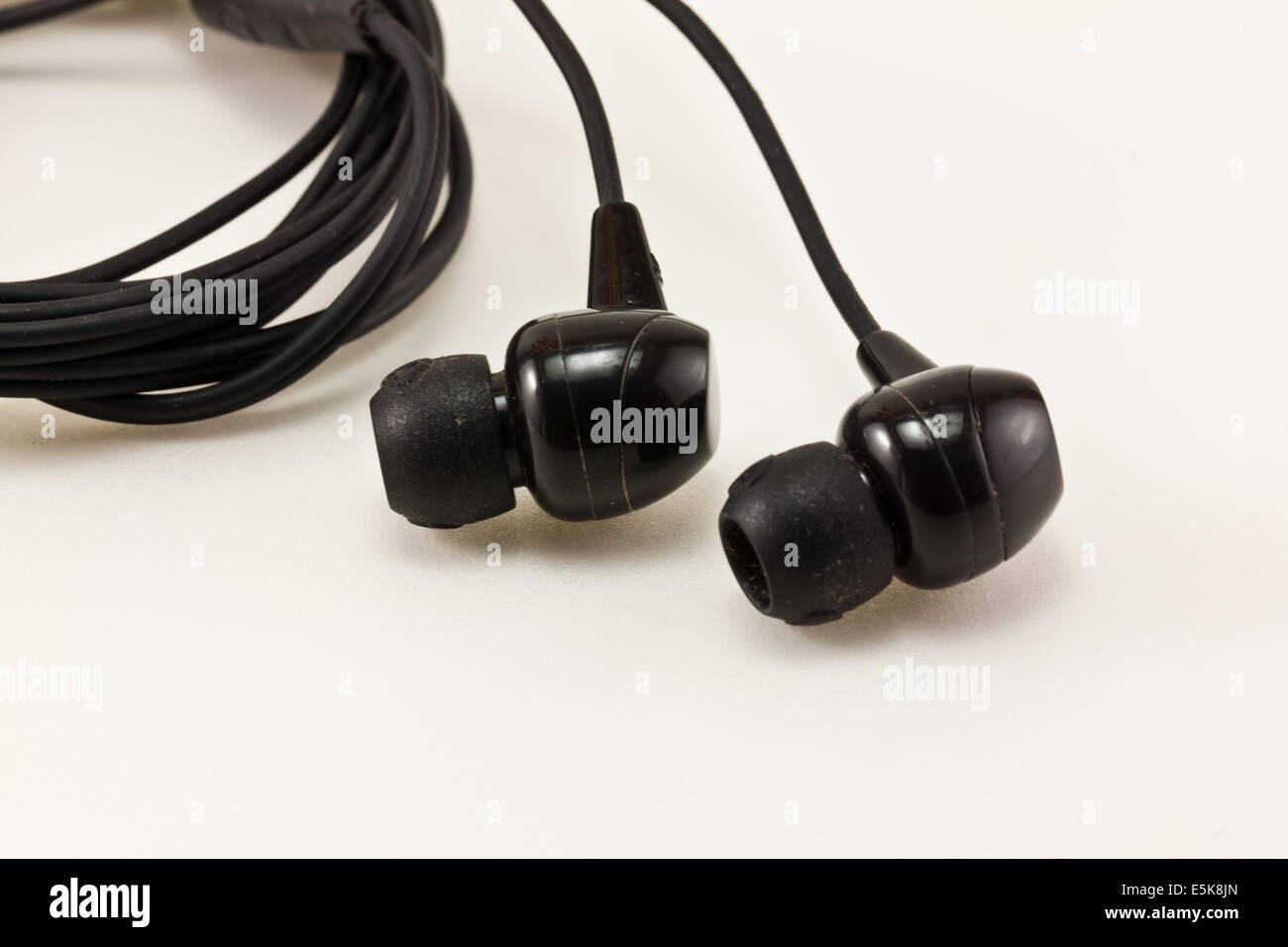 the earphone on paper background Stock Photo - Alamy