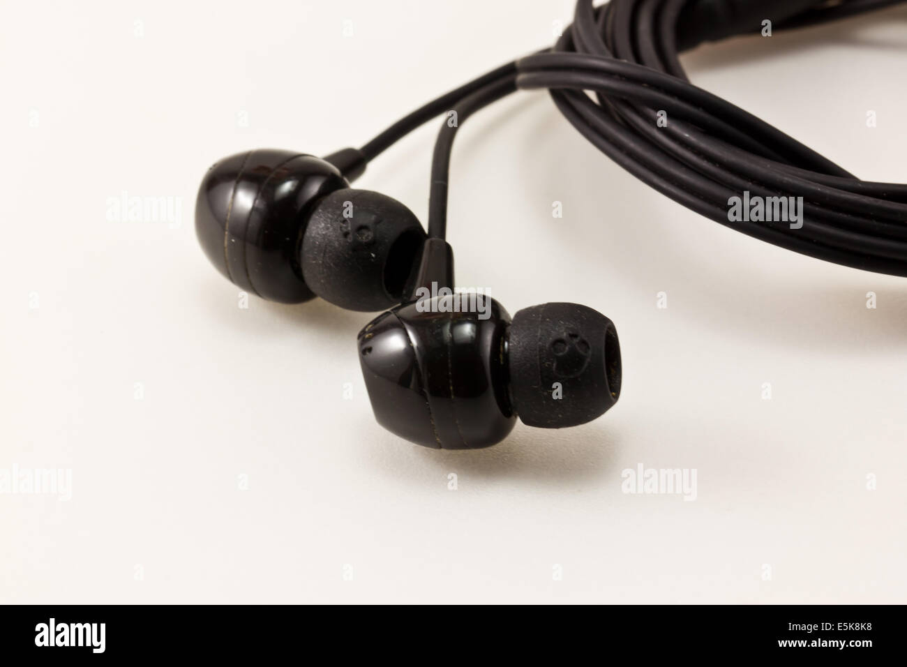 the earphone on paper background Stock Photo - Alamy