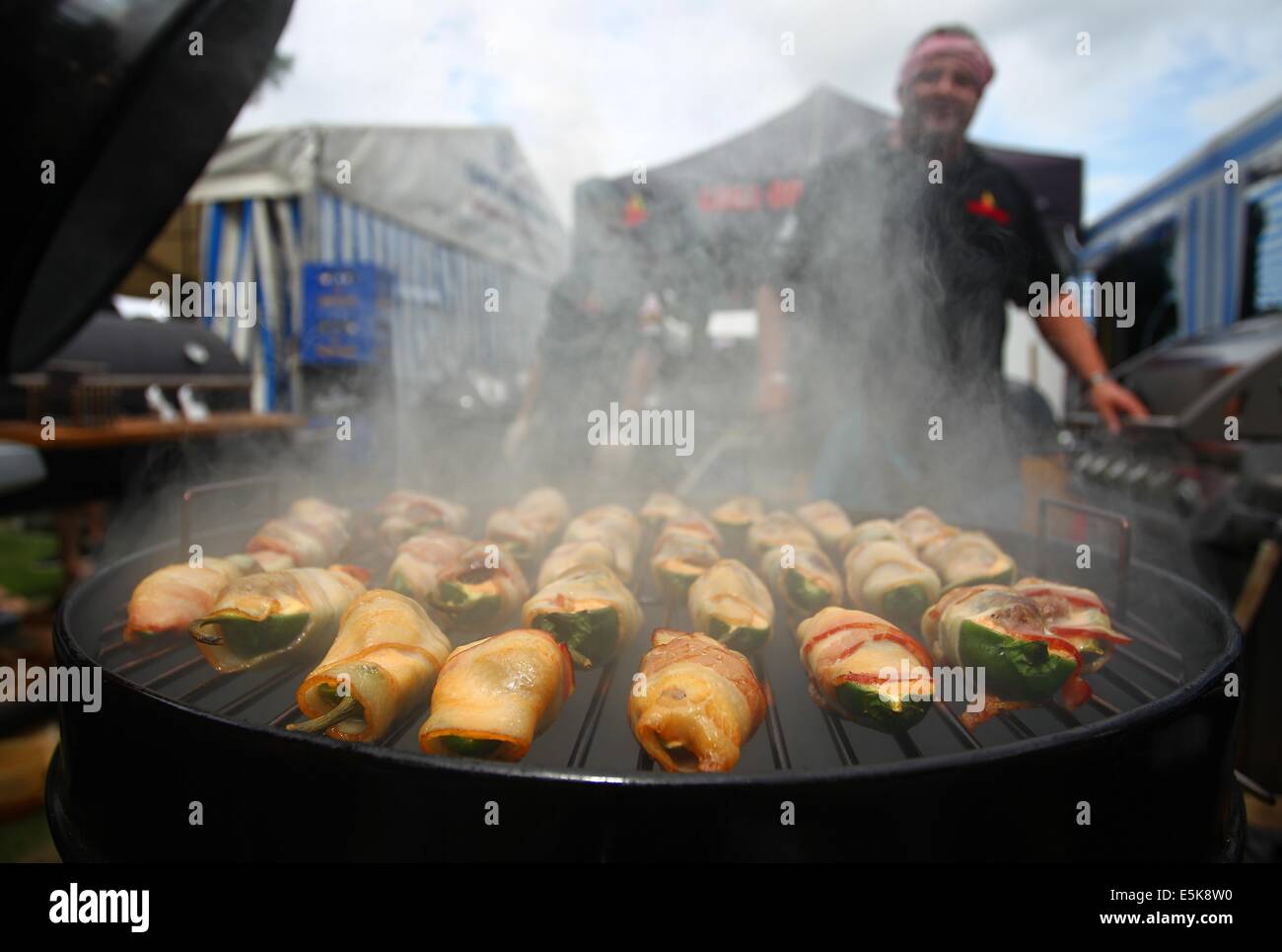 Schweinfurt, Germany. 03rd Aug, 2014. Participants of the German BBQ ...