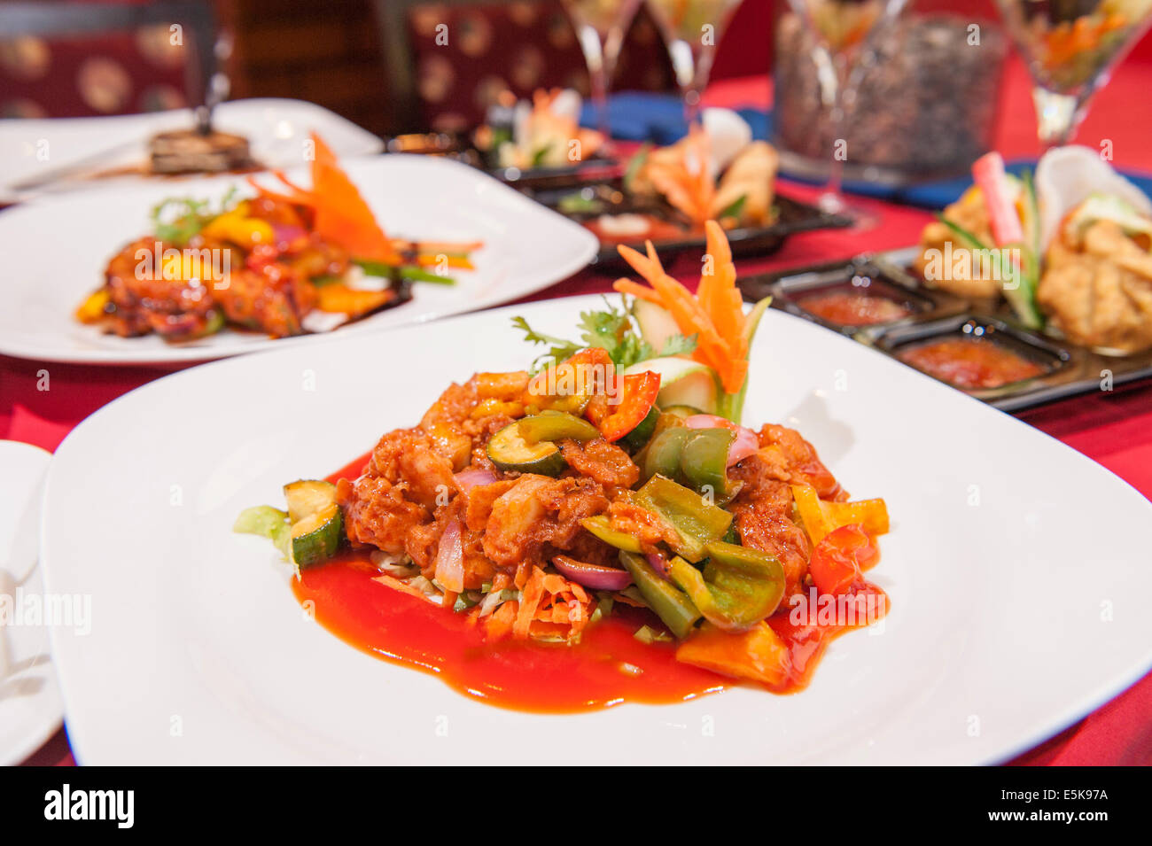 Various selection of chinese meals on table in restaurant Stock Photo ...