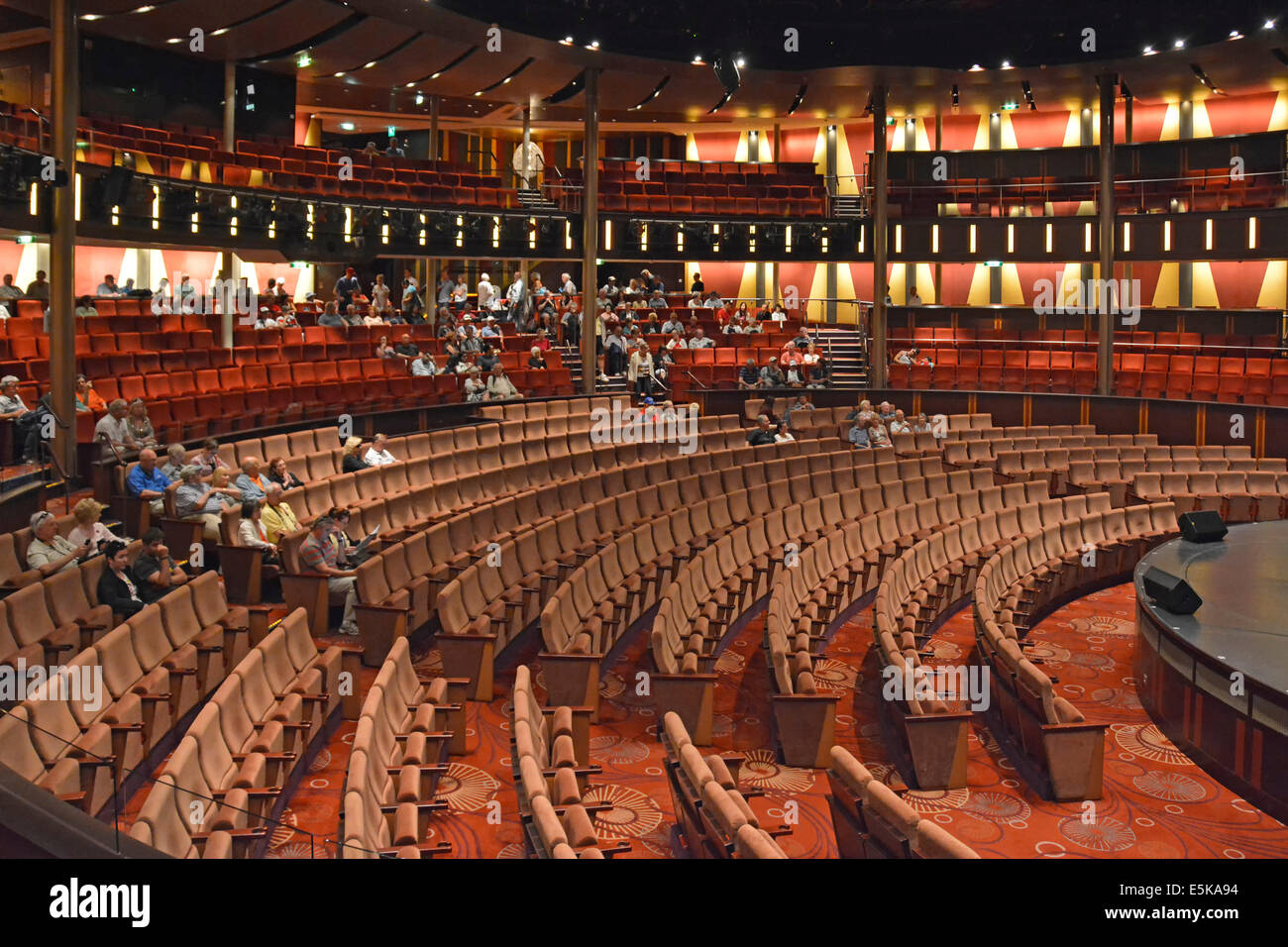 Cruise ship in port theatre being used as a passenger waiting area ...