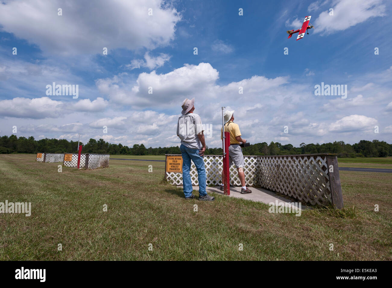 Men flying a remote Control Model Airplane RC R/C Scale Club of Ocala ...