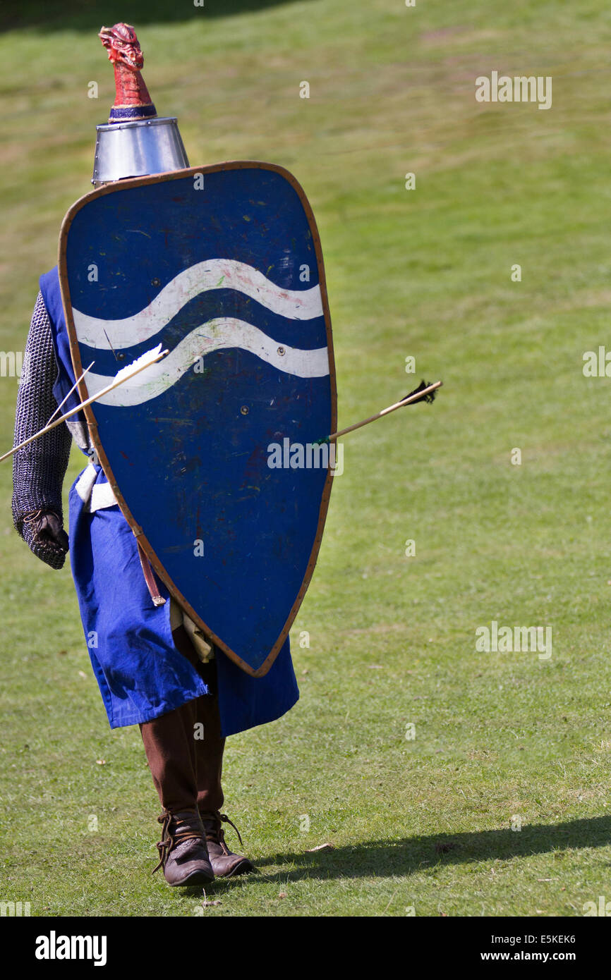 Shielding from a volley of arrows at Beeston, Cheshire, UK 3rd August ...