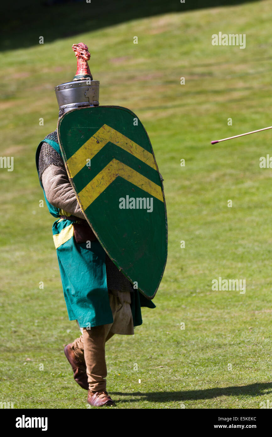 Shielding from a volley of arrows at Beeston, Cheshire, UK 3rd August ...