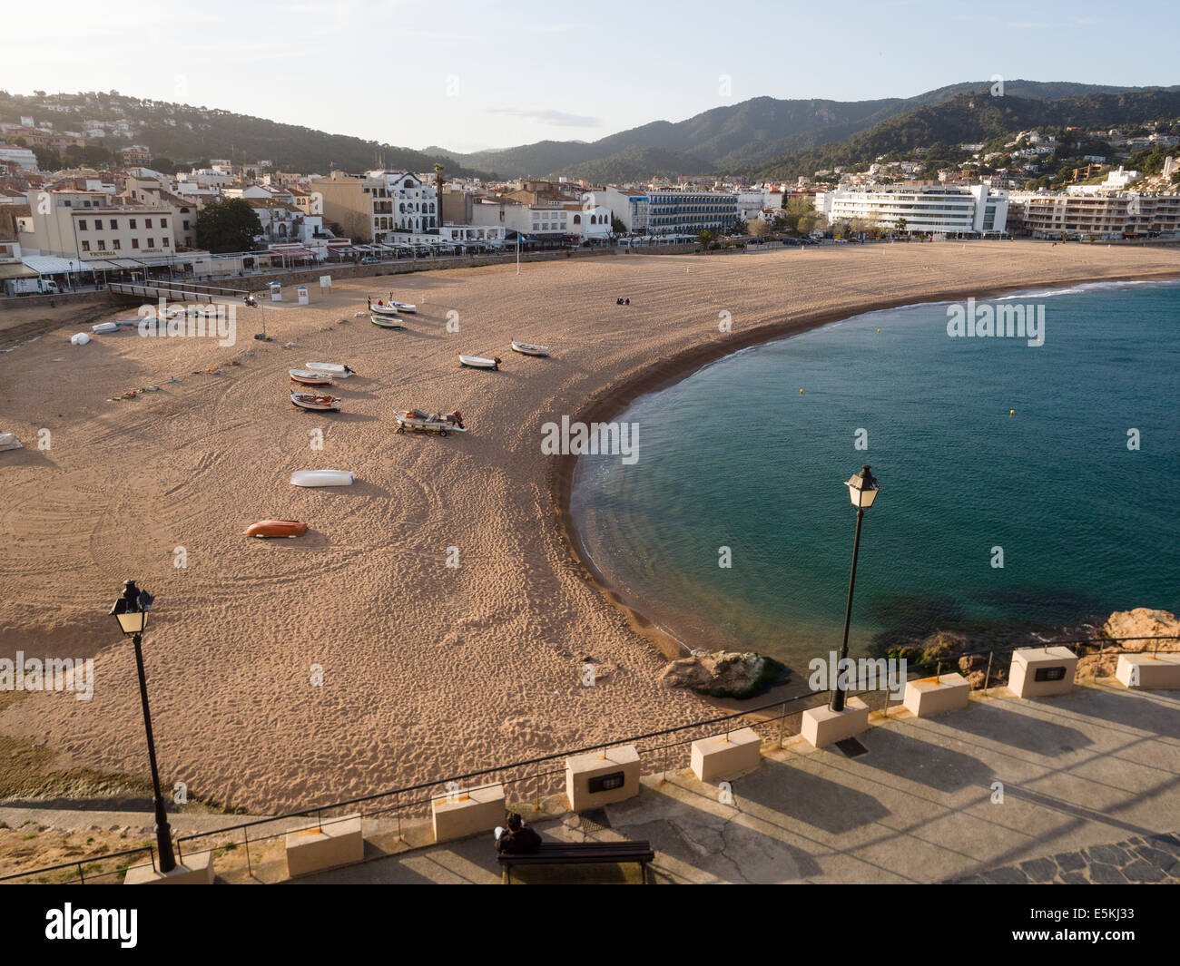 The Beach at Tossa de Mar. The beautiful curve of the sandy beach at ...