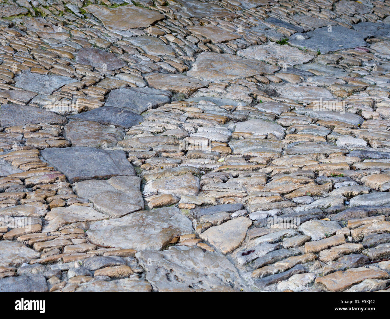 Patterned Cobblestone Street. Stone cobbles create a curved pattern ...