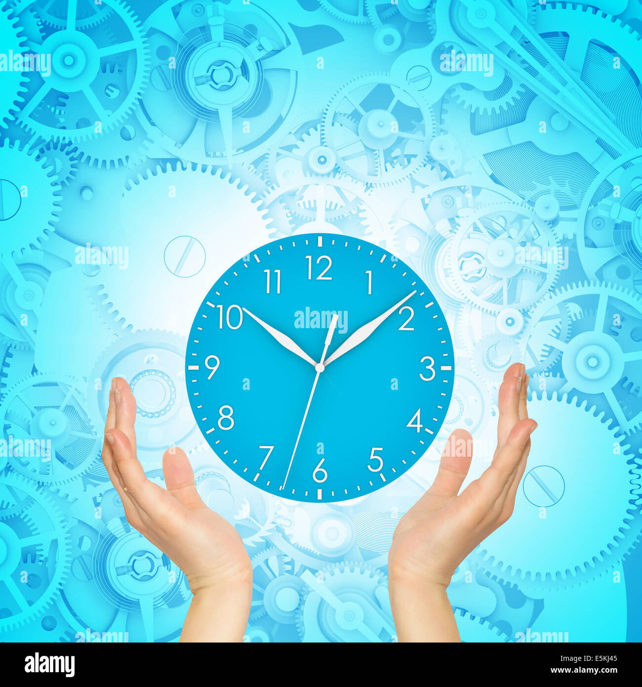 Hands hold clock Stock Photo - Alamy