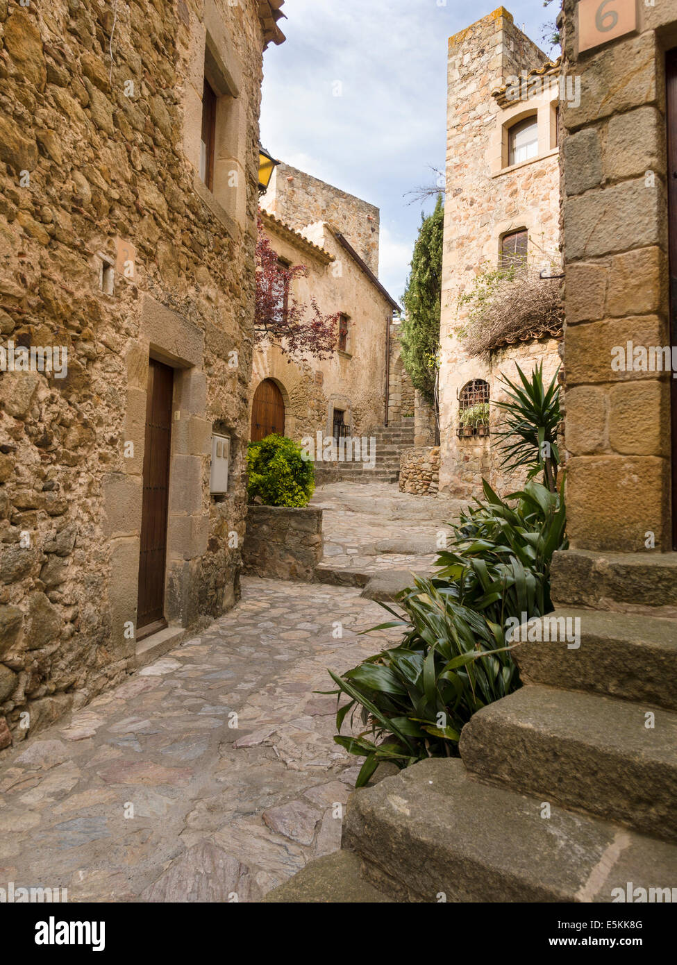 Winding Street in Pals. Stone cobbled laneway in Pals lined with fine ...