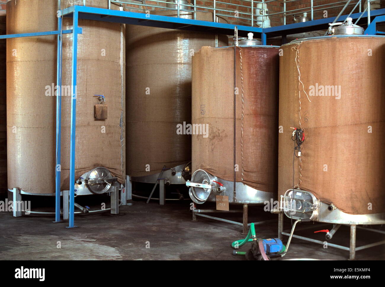 ANOGYRA, CYPRUS. WINE VATS IN A SMALL FACTORY.PHOTO:JONATHAN EASTLAND ...