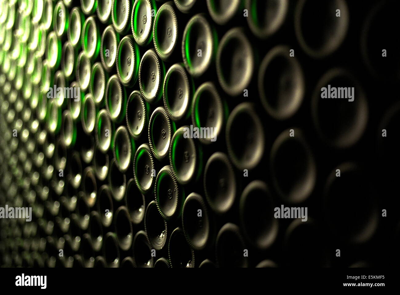 AJAXNETPHOTO. ANOGYRA, CYPRUS. WINE BOTTLES STACKED IN THE CELLAR OF A ...