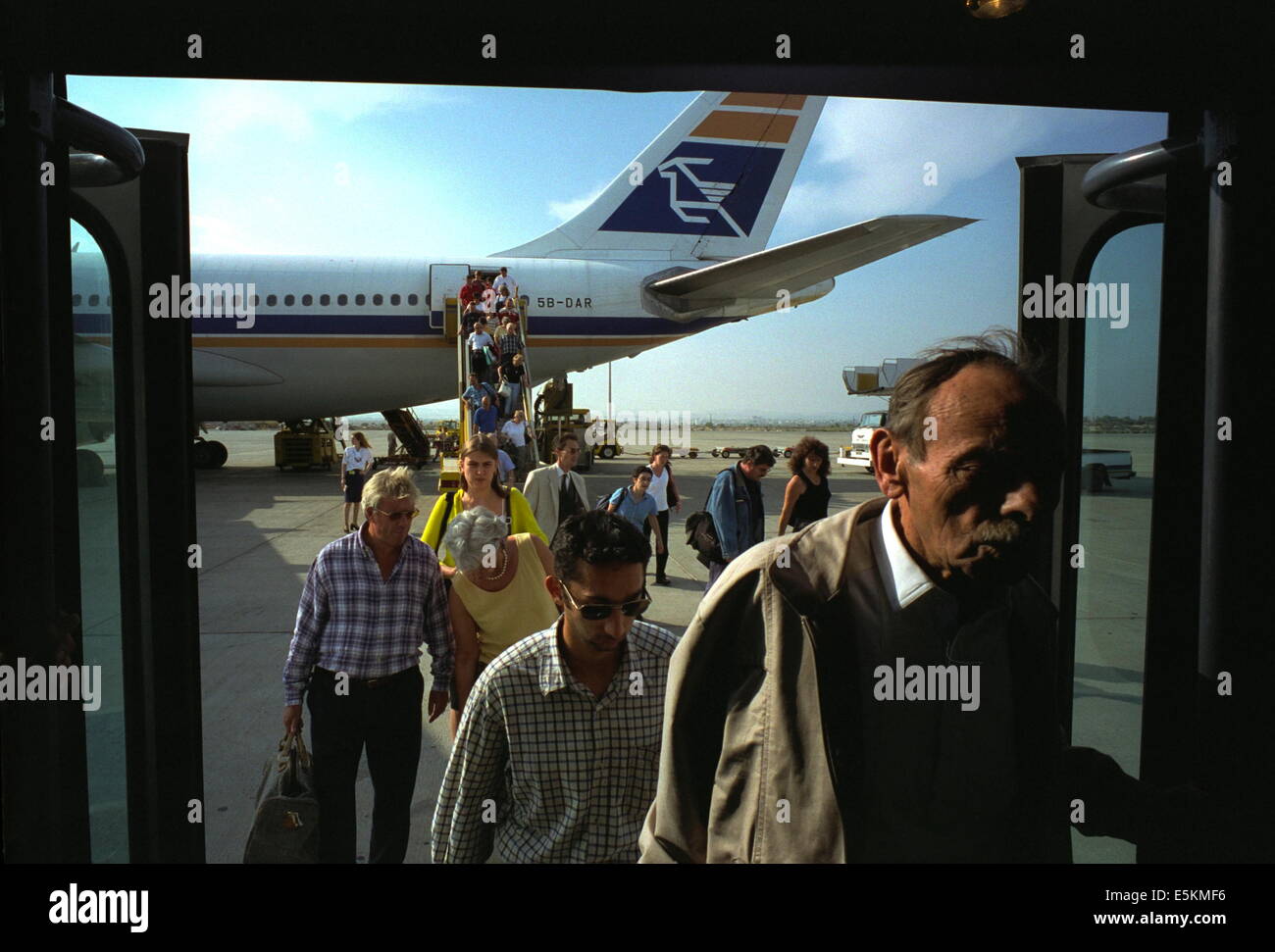 LARNACA, CYPRUS. PASSENGERS DISEMBARKING FROM JET PLANE. PHOTO:JONATHAN ...
